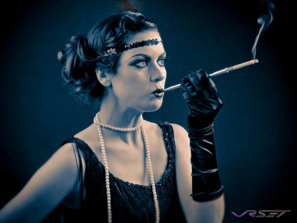 BW-retro-female-model-1930s-look-holding-long-cigarette-holder ...